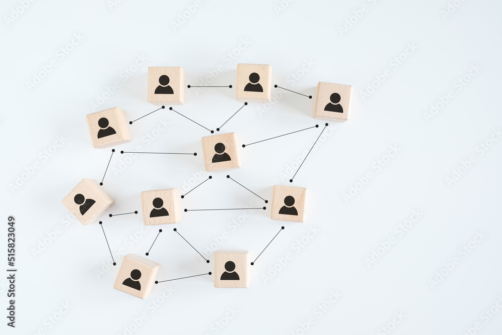 Teamwork, Connection. Building a strong team, Wooden blocks with people ...