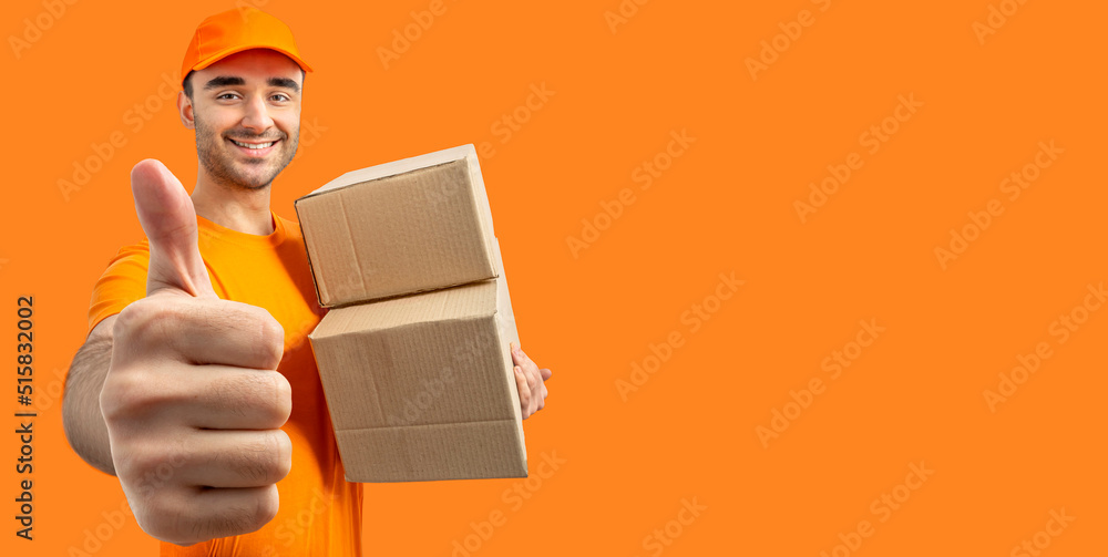 Delivery man with a box, thumb up. Courier in uniform cap and t-shirt ...