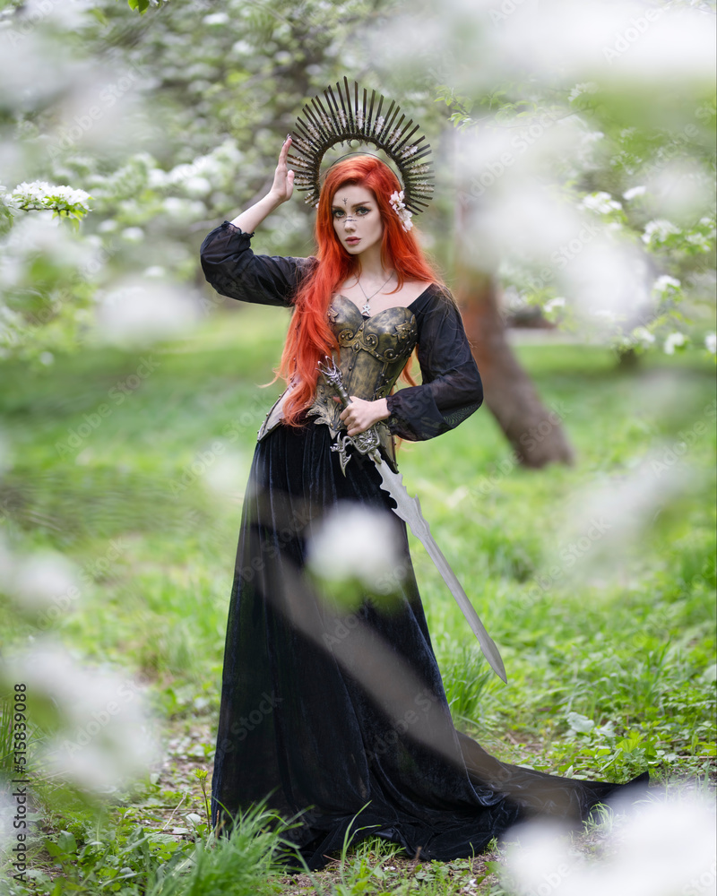 Art photo of a Valkyrie with a sword in a blooming garden Stock Photo ...