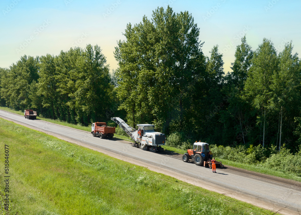 Cold milling during road construction and asphalt repair. Cold milling ...