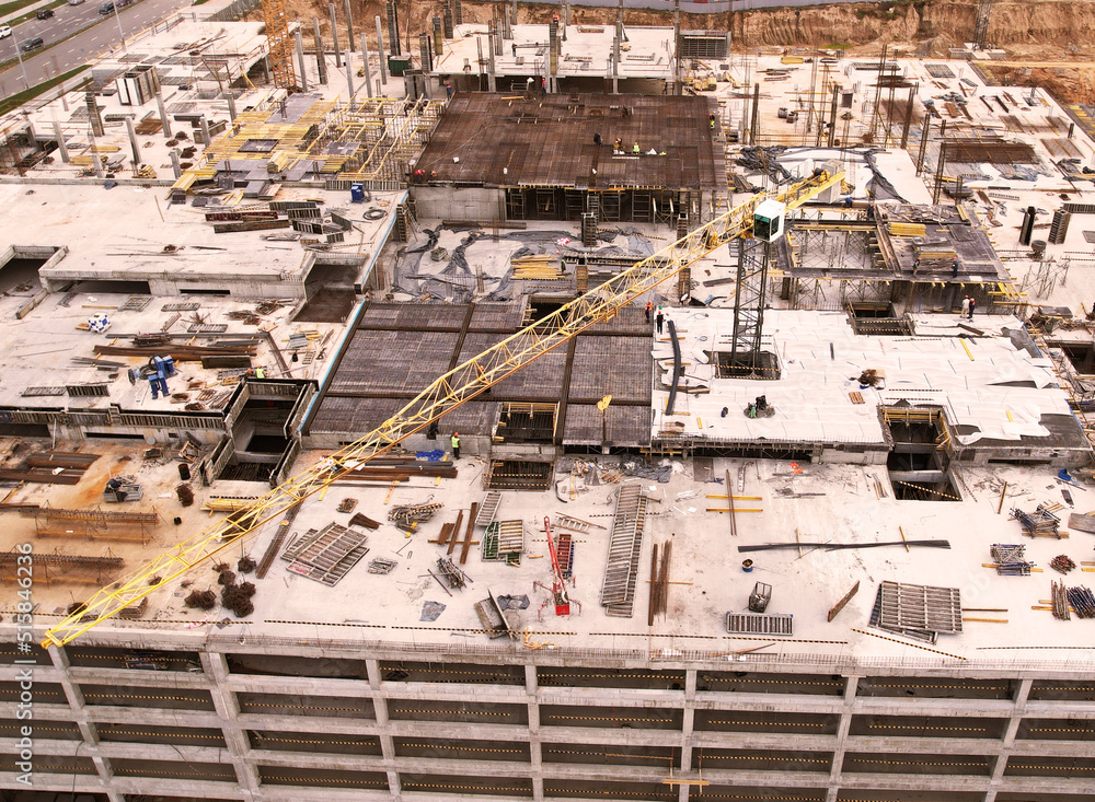 Construction site, top view. Tower crane on formwork. Reinforced ...