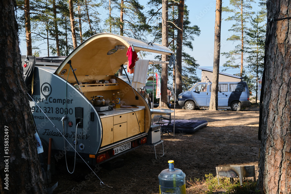 Leningrad Region, Russia - June 2022. Small gray trailer with modular ...
