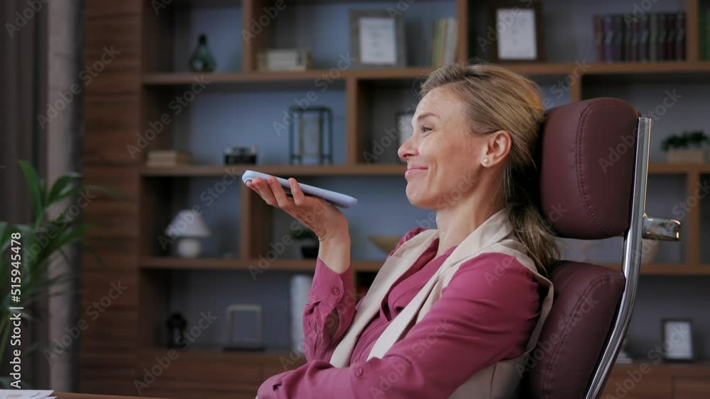 Beautiful blondie woman recording voice message on smartphone ...