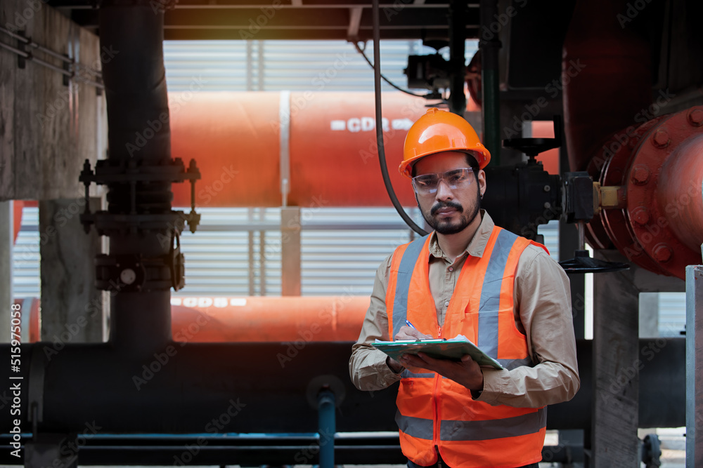 Engineer under checking the industry cooling tower air conditioner is ...