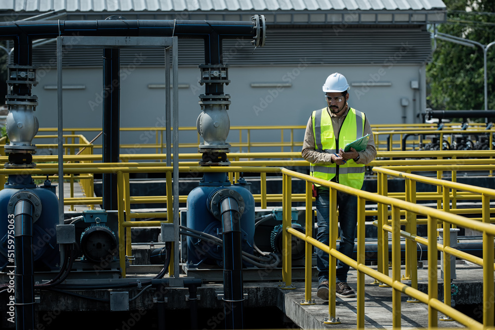 industrial workers at work. Wastewater treatment concept. Service ...
