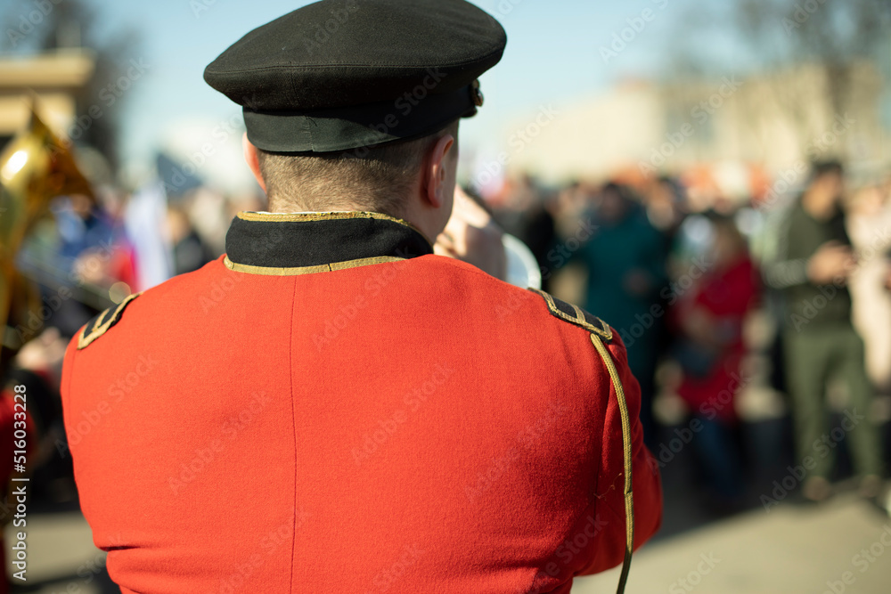 Orchestra with wind instruments. Trumpeters in ceremonial uniforms ...