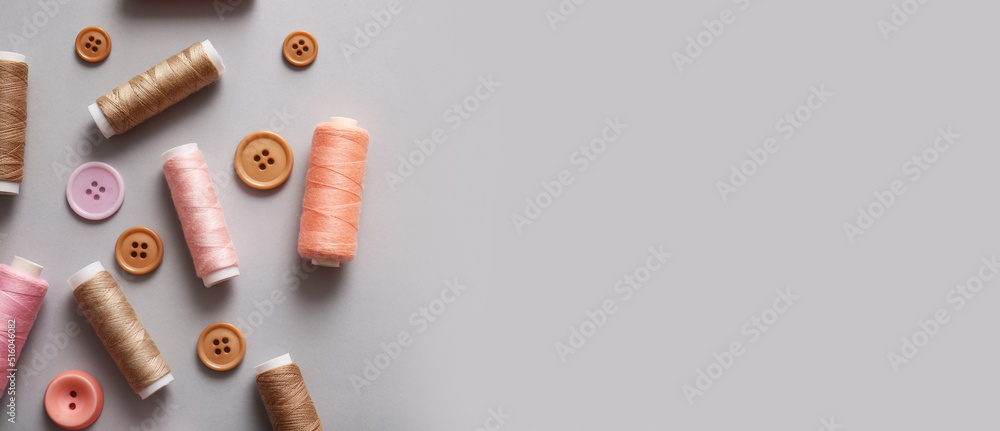 Sewing threads and buttons on grey background with space for text Stock ...