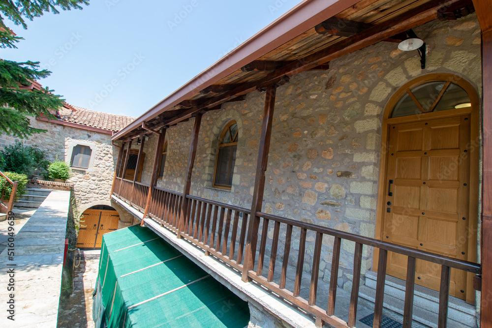 View of a Orthodox monastery and Kalabaka town from the top of the ...