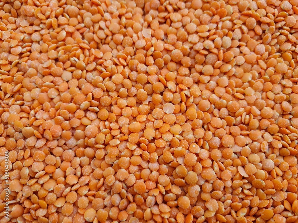 Full background of orange lentils, also known as Syrian lentils, top ...