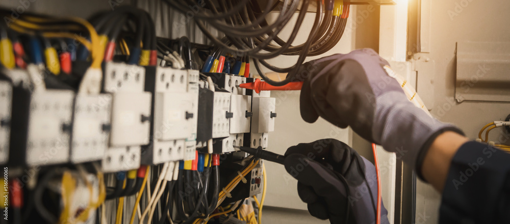 Electricity and electrical maintenance service, Engineer hand holding ...
