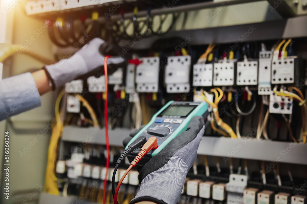 Electricity and electrical maintenance service, Engineer hand holding ...