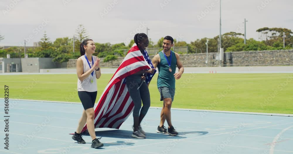 Team of patriotic olympic athletes celebrating victory, walking and ...