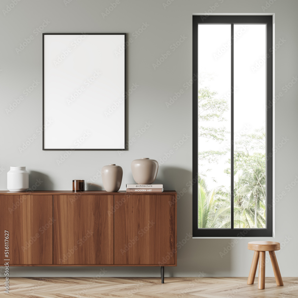 Light living room interior with wooden drawer, window and mockup frame ...