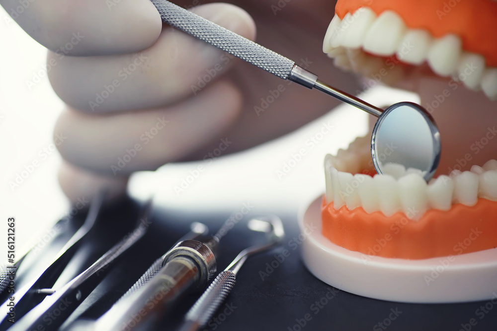 Dentist's office. Dentist examines the oral cavity before treatment ...