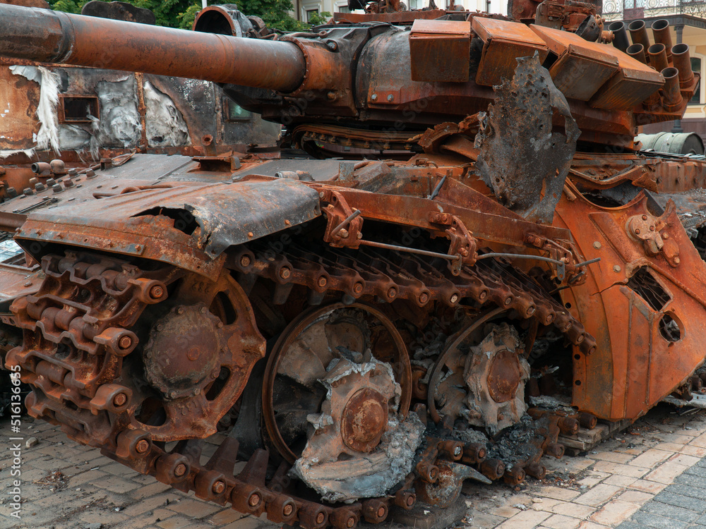 Destroyed Russian tank. Rusty armor of military equipment. Military ...