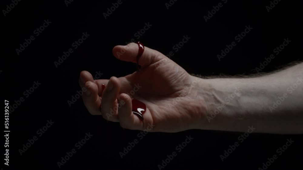 Close-up caucasian male hand covered in blood, crime scene, bloody hand ...