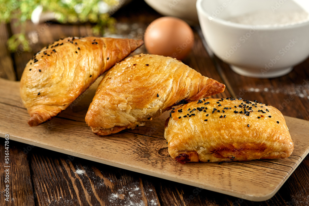aditional uzbek pastry - samsa with meat. Uzbek pies with meat and puff ...