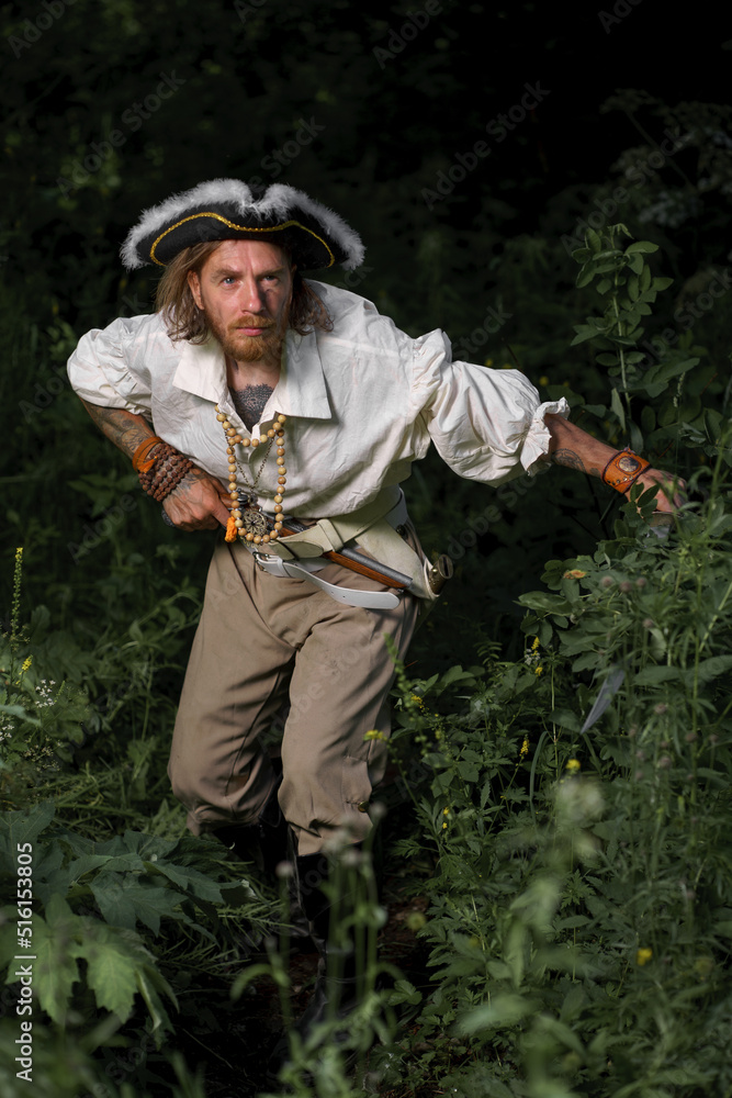 Sea robber ship captain armed pirate goes through jungle. Concept ...