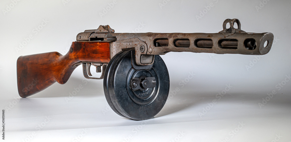 Submachine gun ppsh-41 on a light background. Stock Photo | Adobe Stock