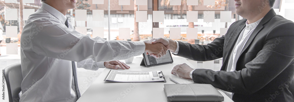 Employer or HR department welcomes new employees, Shaking hands with ...