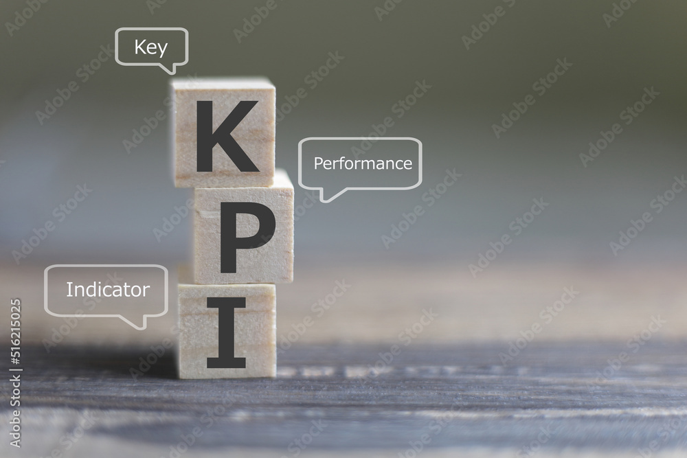 Pile with three wooden cubes - letters KPI meaning Key Performance ...