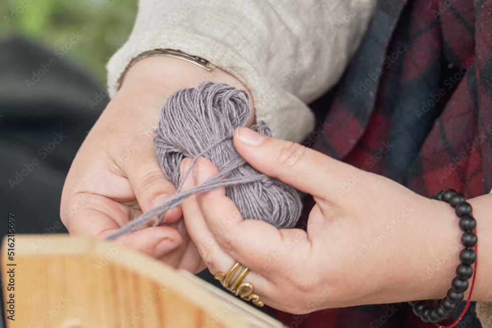 An ancient Roman woman makes yarn and sews from vintage wool ...