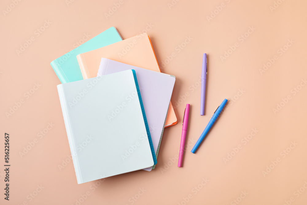 Desktop with notebooks mockup over pastel background. School and office ...