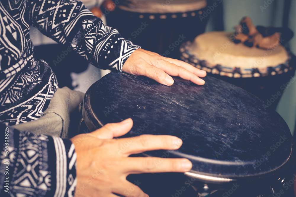 Djembe, Peoples hand playing music at djembe drums,African drums Stock ...