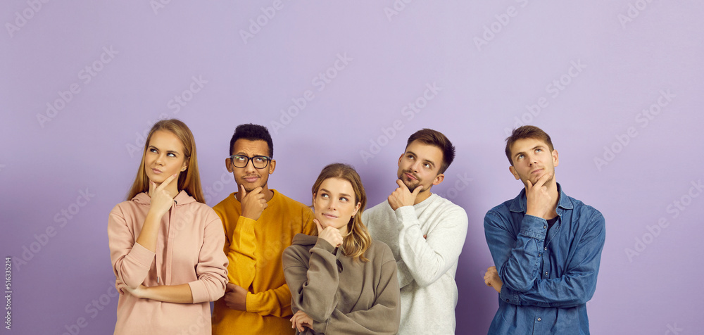 Group of young people thinking of answer to difficult question ...