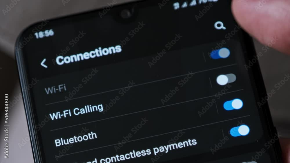Turning on and off Wi-Fi on a smartphone. The wifi button is turned on ...