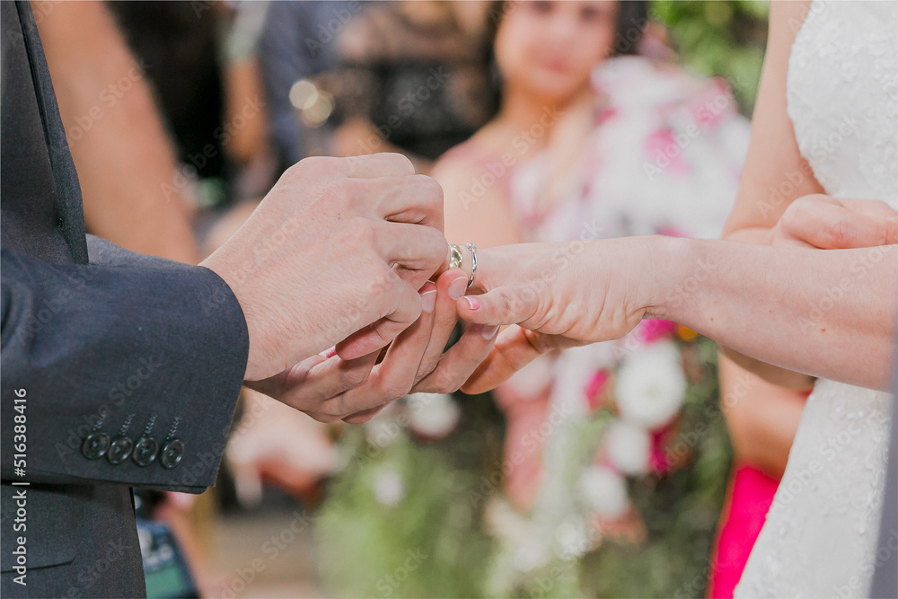 Hands of bride and groom at Happy wedding ceremony to exchange of ...