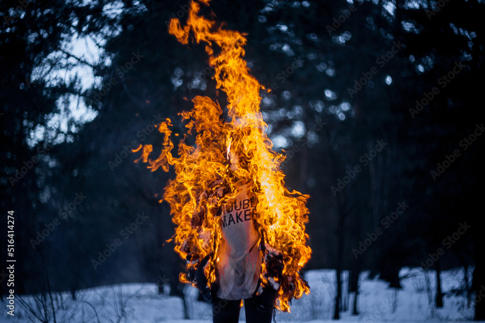 Burning clothing per person. A burning silhouette of a man. Image of a ...