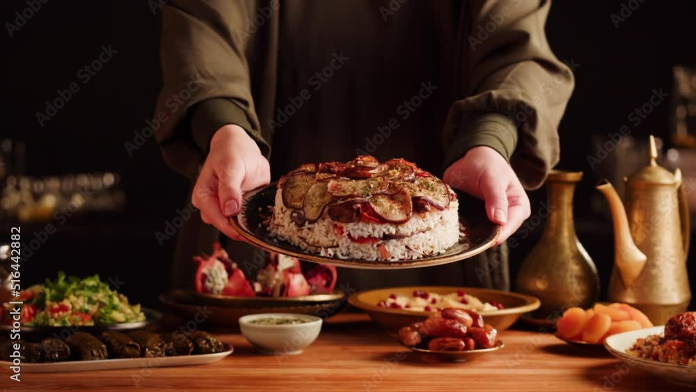 Kabsa, maqluba, dolma, tabbouleh close-up, rice and meat dish, middle ...