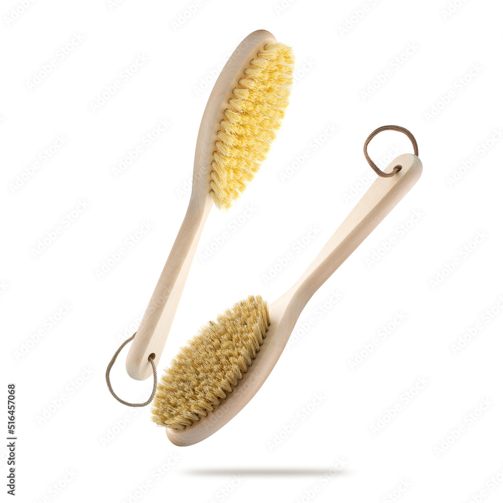 Two body brushes float on a white background. Massage brushes made of ...