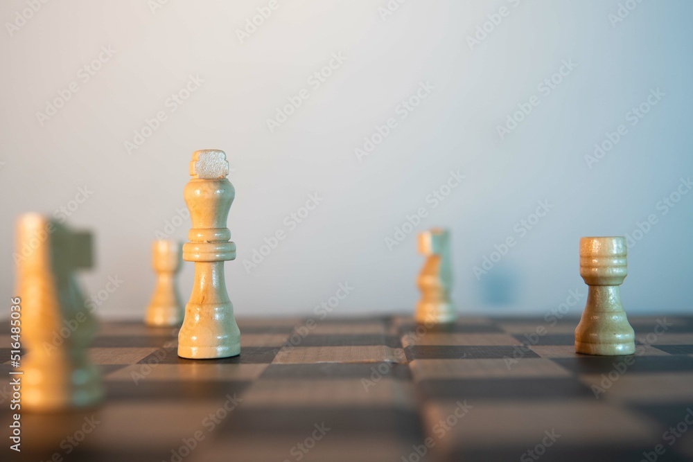 Chess game with pure white pieces. White background behind. Front view ...
