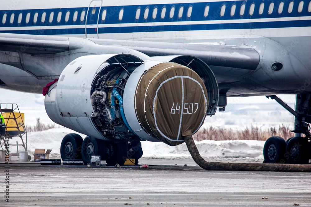 Airplane engine with aircraft wing on runway of airfield Stock Photo ...