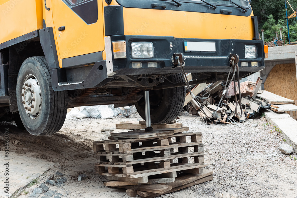 Extended hydraulic outrigger to increase crane stability. Truck crane ...