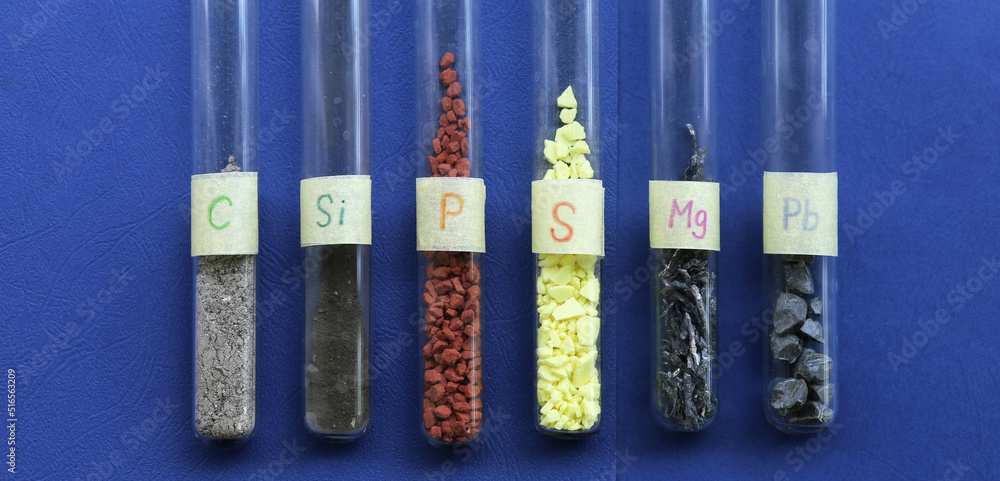 Simple inorganic chemicals in test tubes on a blue background: gray ...