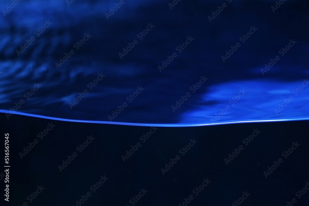 Cross section of water surface, black to azule color image texture ...