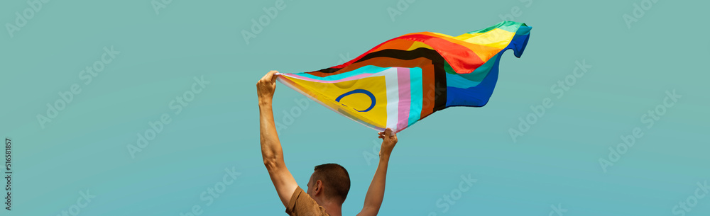 man waving a progress pride flag outdoors, banner Stock Photo | Adobe Stock