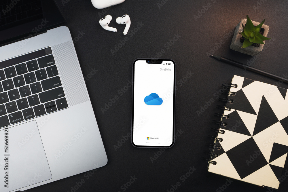 Microsoft Onedrive cloud storage app on the smartphone screen on black ...