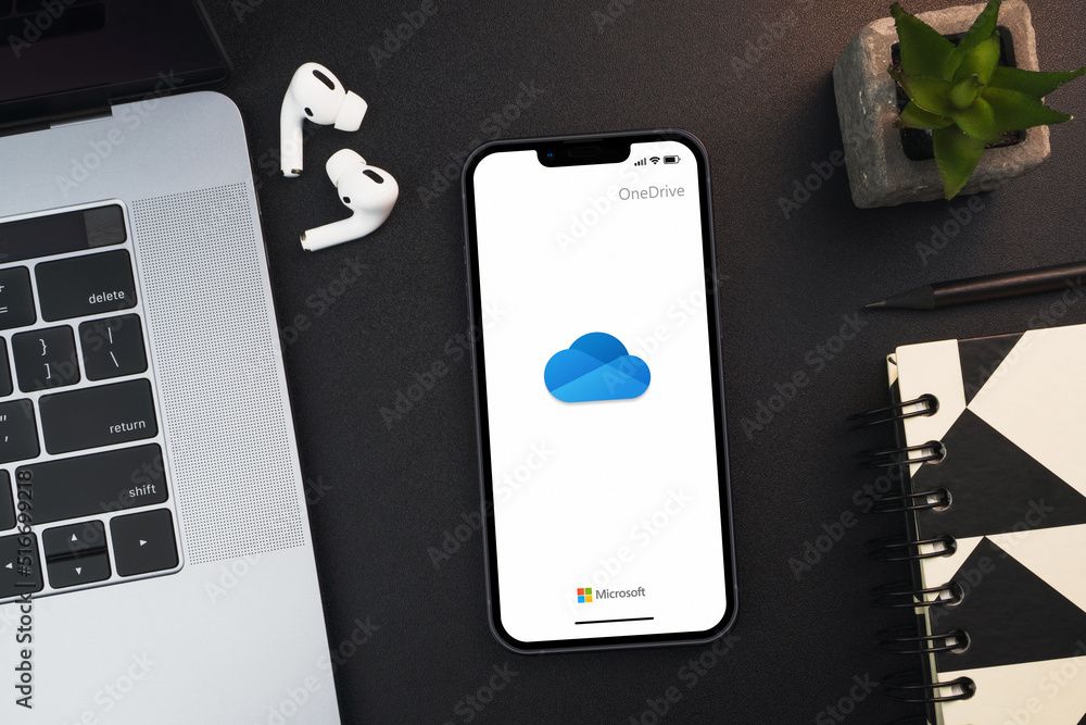 Microsoft Onedrive cloud storage app on the smartphone screen on black ...