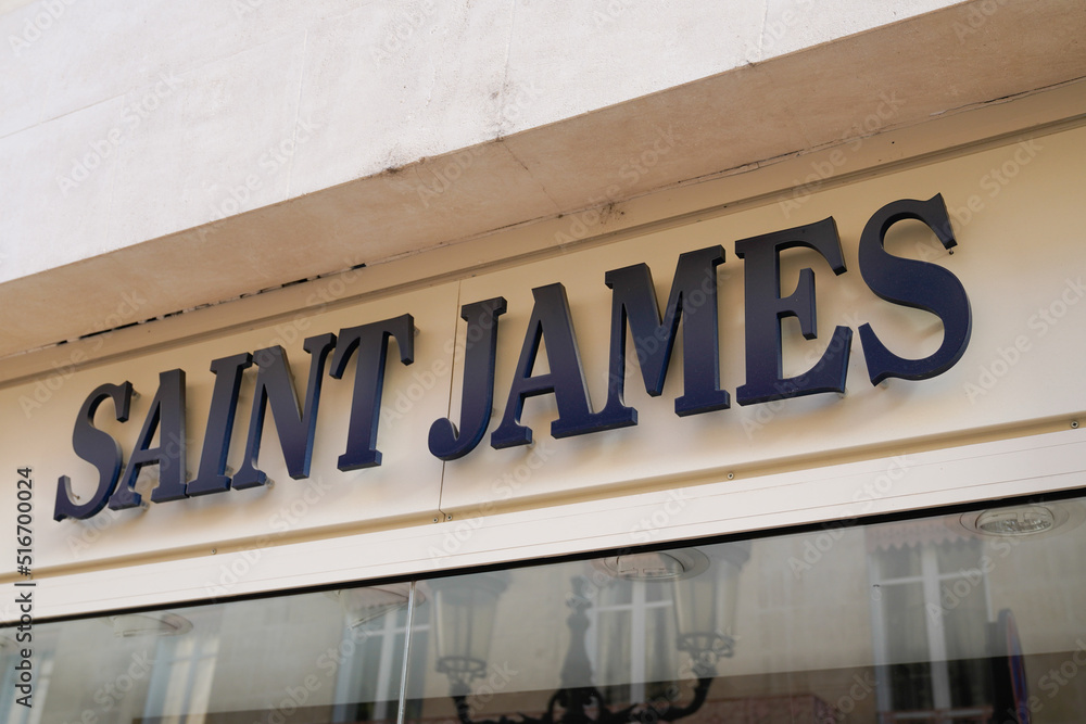 Saint james shop brand logo and sign text on windows facade entrance ...