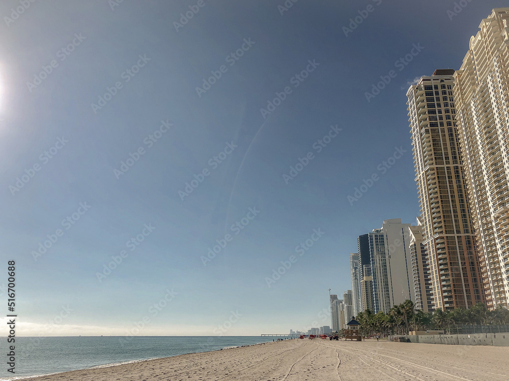 Oceanfront resort hotels skyline of Miami Beach with skyscraper houses ...