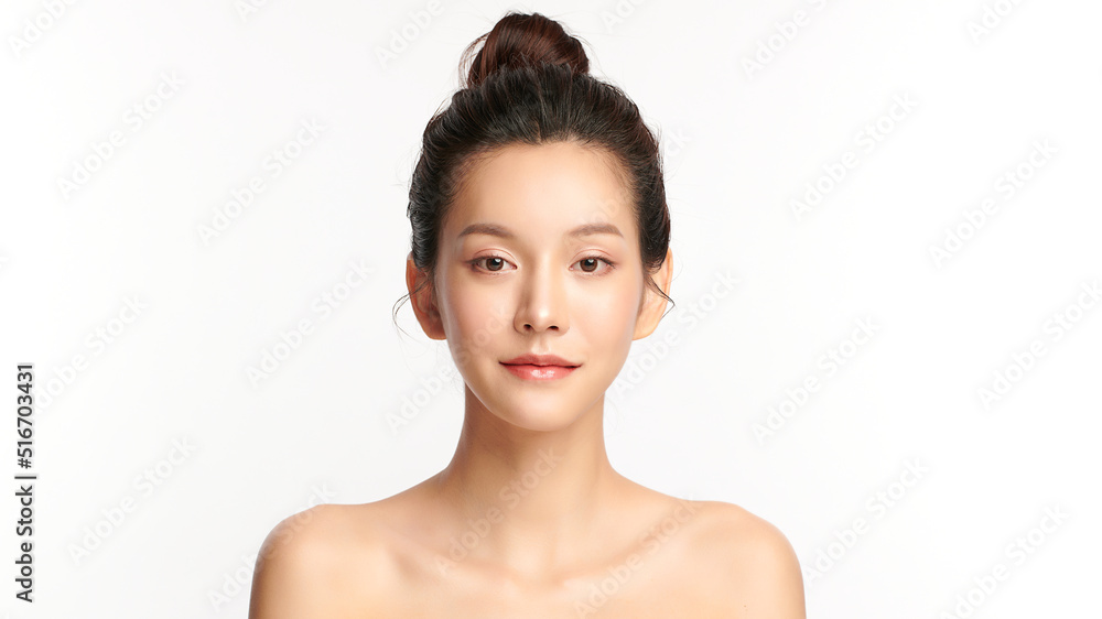 Beautiful young asian woman with clean fresh skin on white background ...
