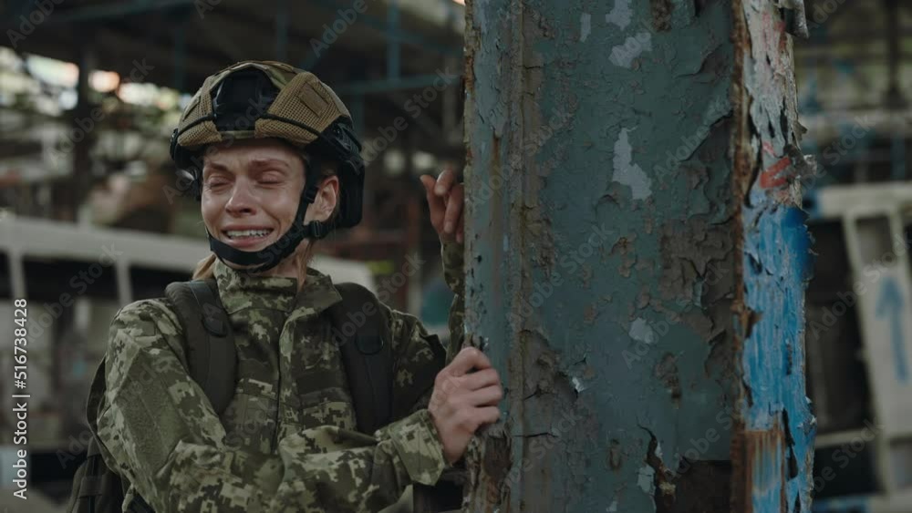 Close up of exhausted female sergeant crying and mourning for fallen ...