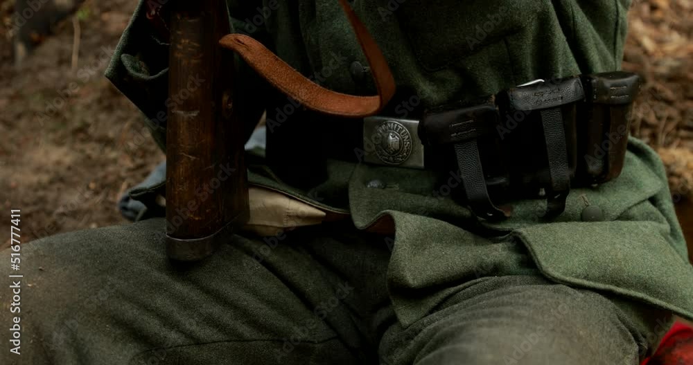World War II German Soldier Cleaning Rifle. Soldier Preparing Weapon ...