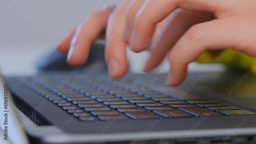 Programmer coding on laptop keyboard. IT specialist person typing text ...