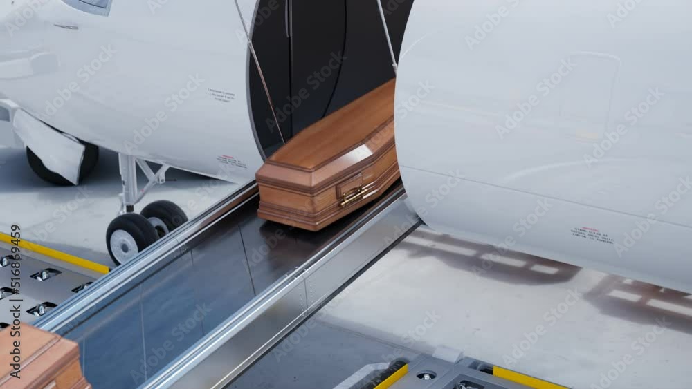 Coffins on the conveyor belt. Transport to the aircraft compartment ...