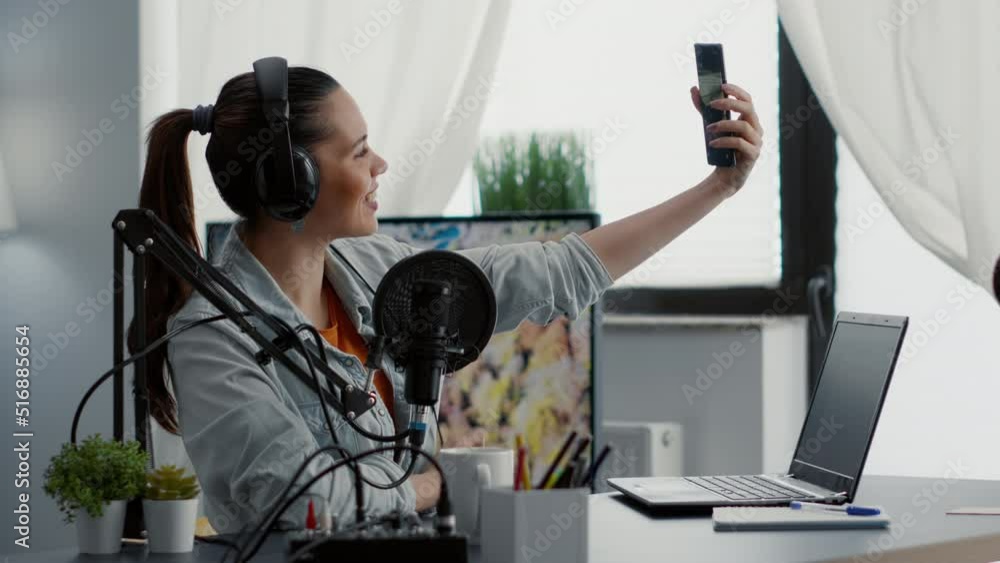 Famous internet influencer taking selfie photo with smartphone while ...